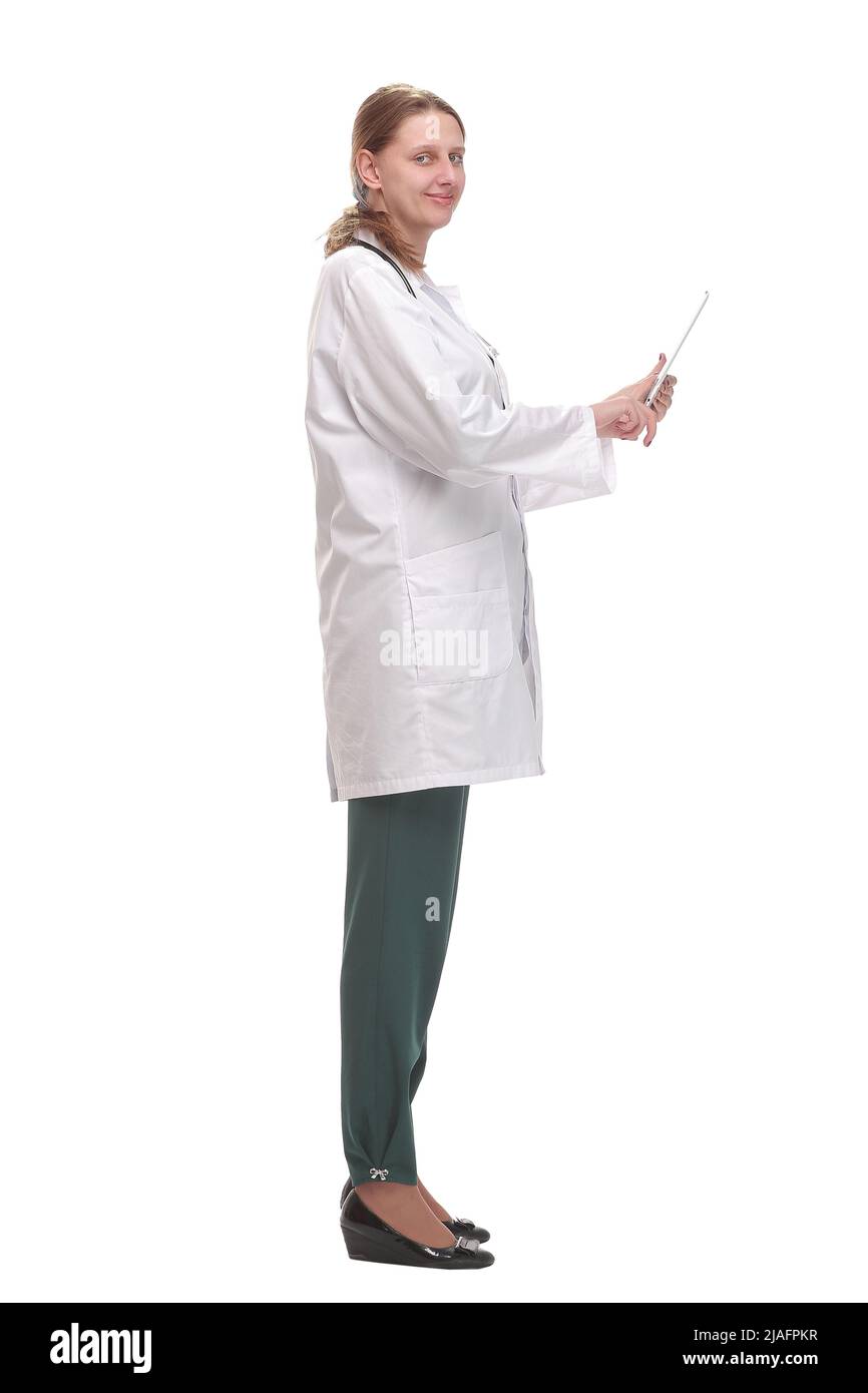 Side view of happy female doctor writing patient chart on digital ...