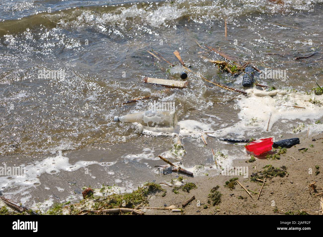 Garbage thrown out by waves beach, pollution of environment of human ...