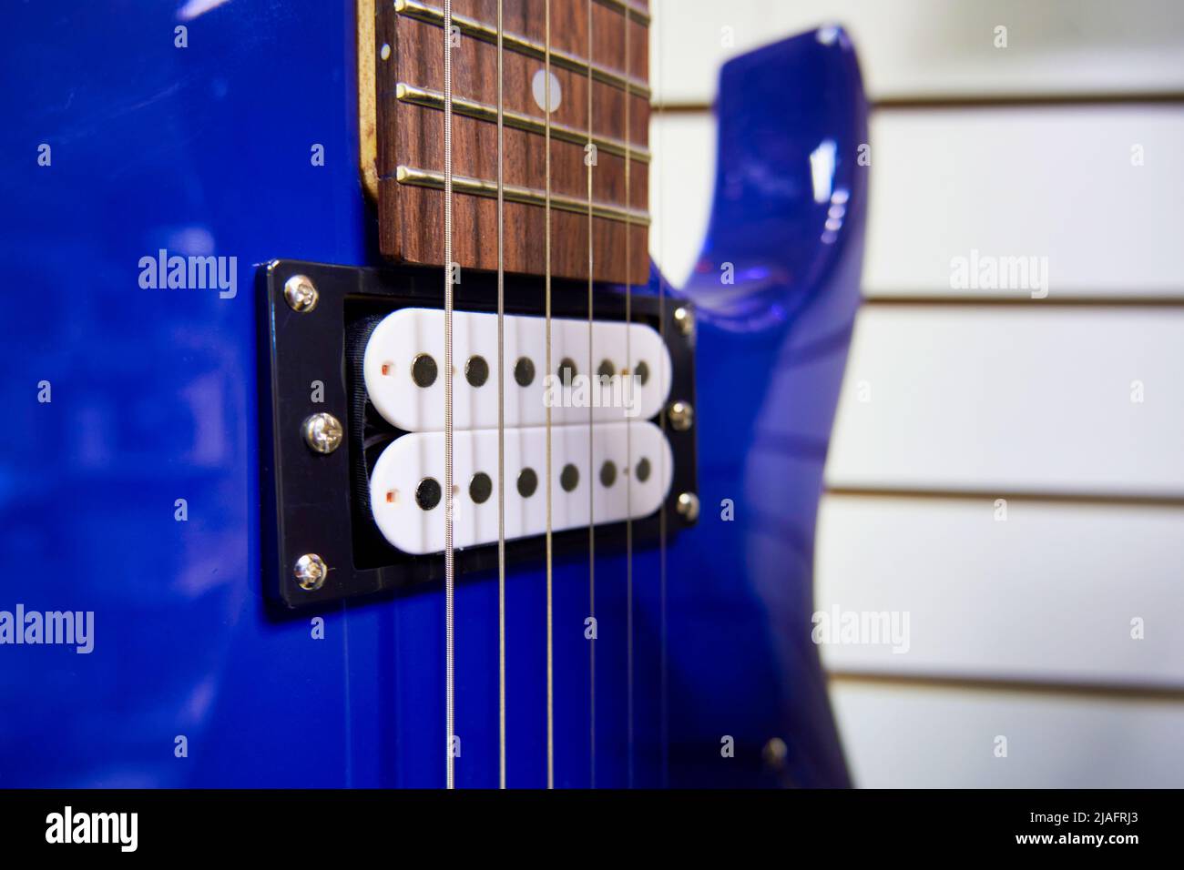Blue electric guitar Stock Photo - Alamy