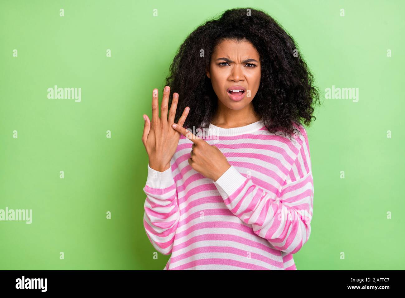 Portrait of attractive trendy worried angry girl showing finger without ...