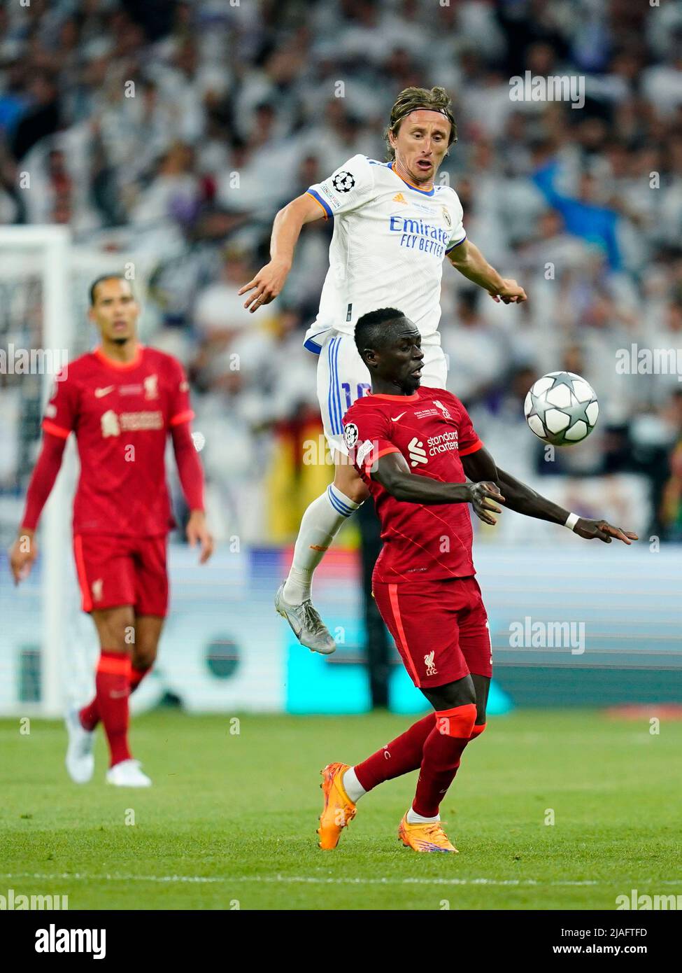 Luka Modric of Real Madrid and Sadio Mane of Liverpool FC during the ...