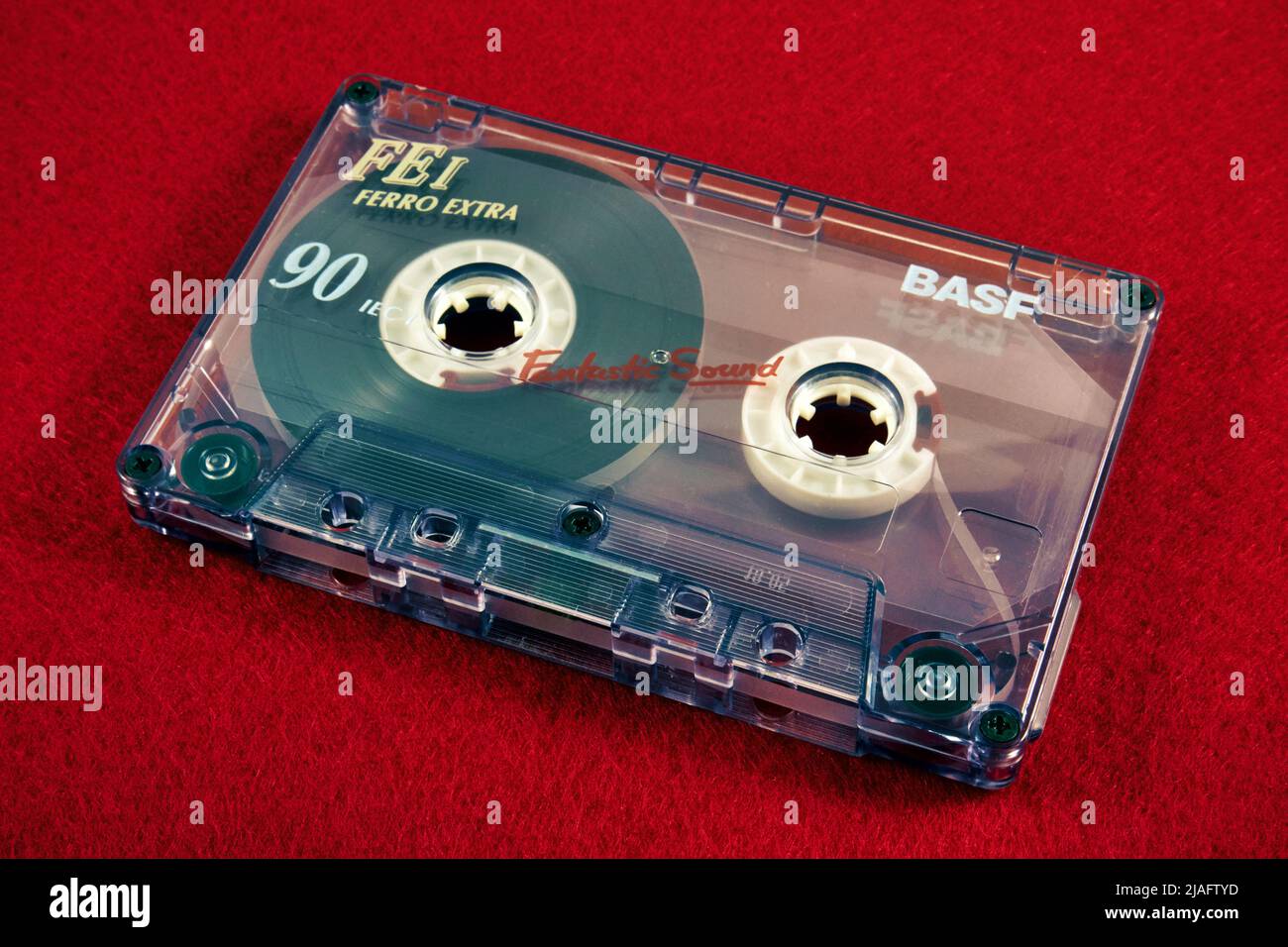 Audio cassette on a red background. Analog audio tape recording Stock ...