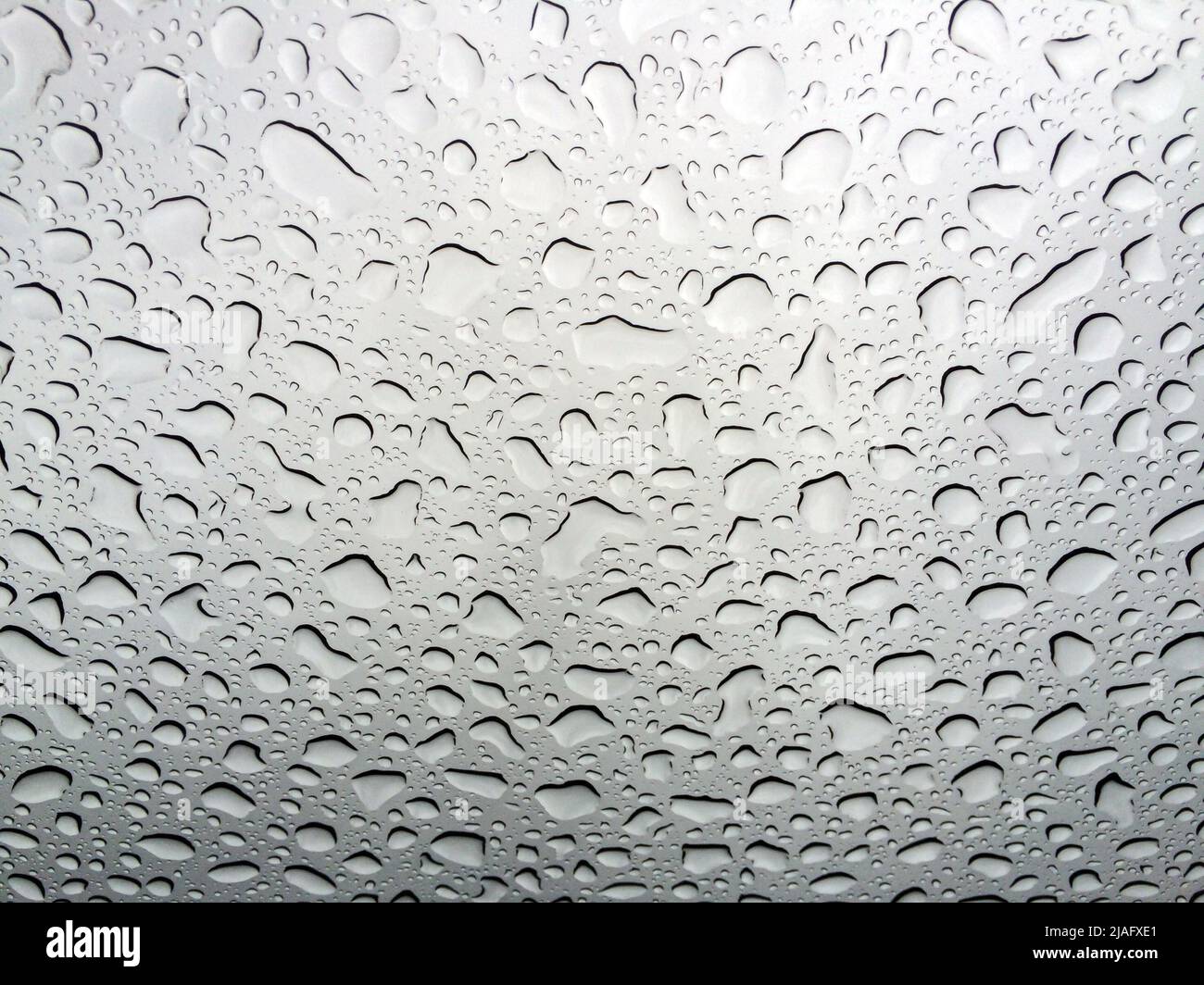 Abstract texture of water drops on a glass Stock Photo - Alamy