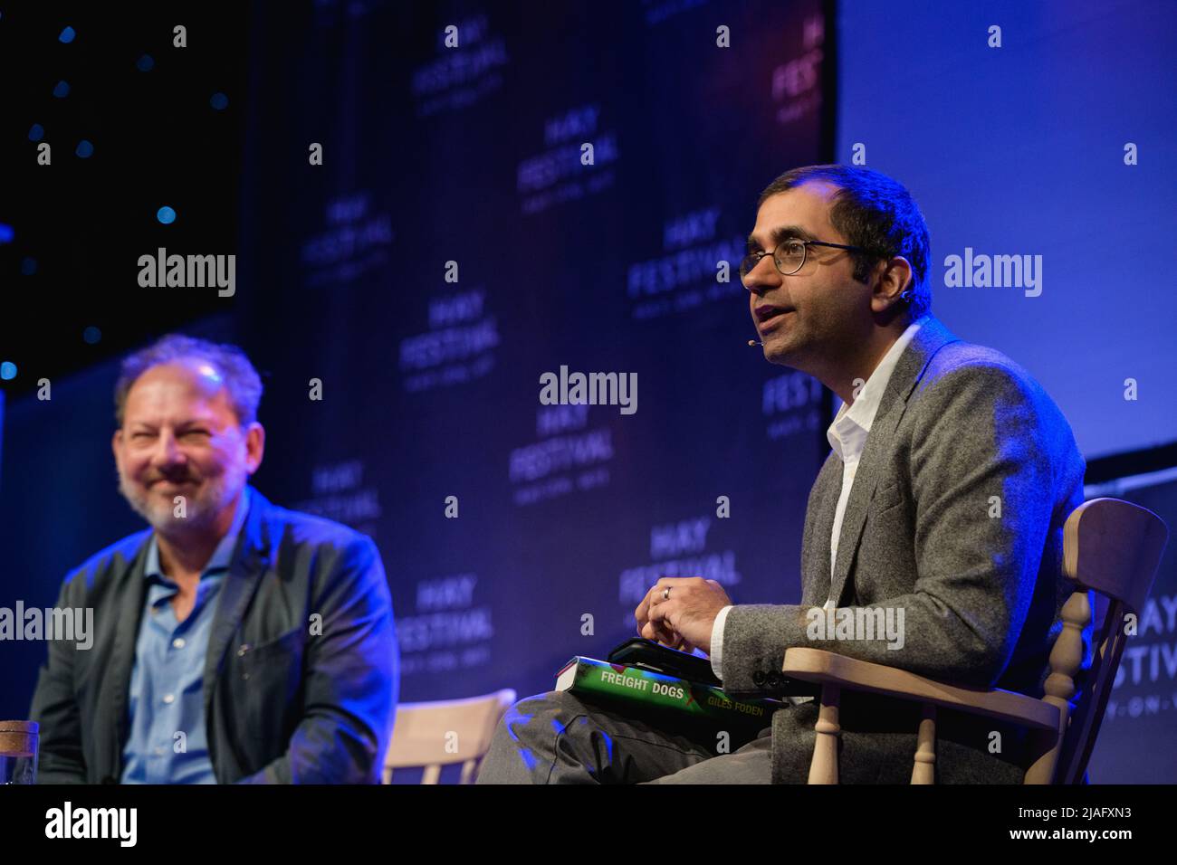 Hay-on-Wye, Wales, UK. 30th May, 2022. Giles Foden talks to Sameer ...