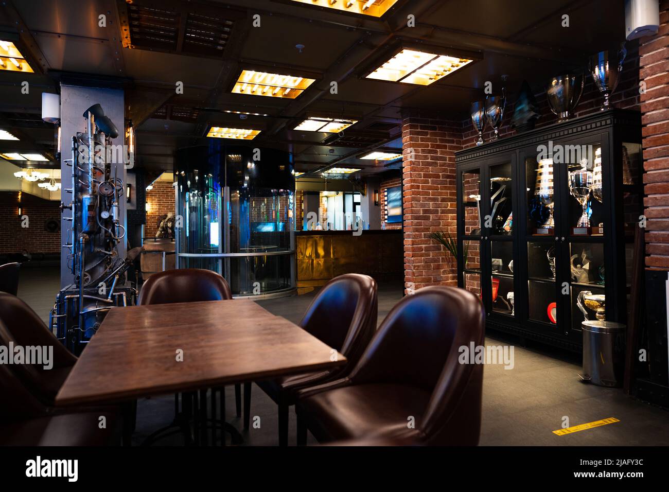 Interior of a dark pub loft interior Stock Photo - Alamy