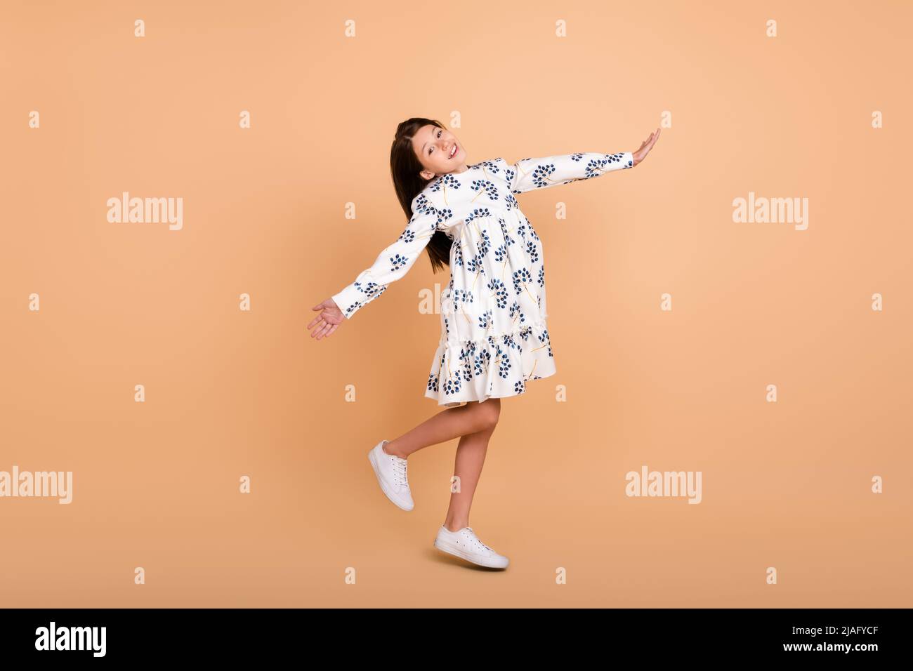 Full length body size view of attractive cheery girl jumping dancing ...