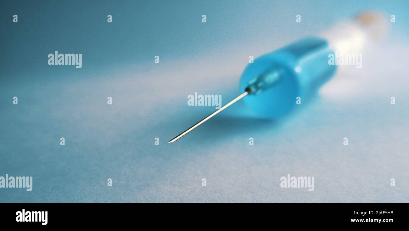Medical syringe with a needle close-up. Syringe filled with liquid ...