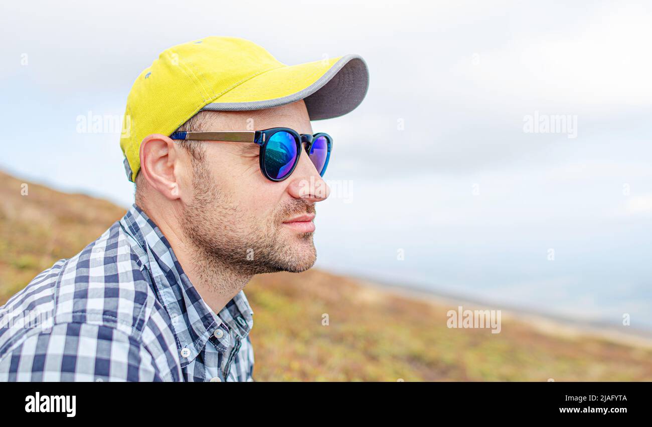 Man in cap glasses hi-res stock photography and images - Alamy