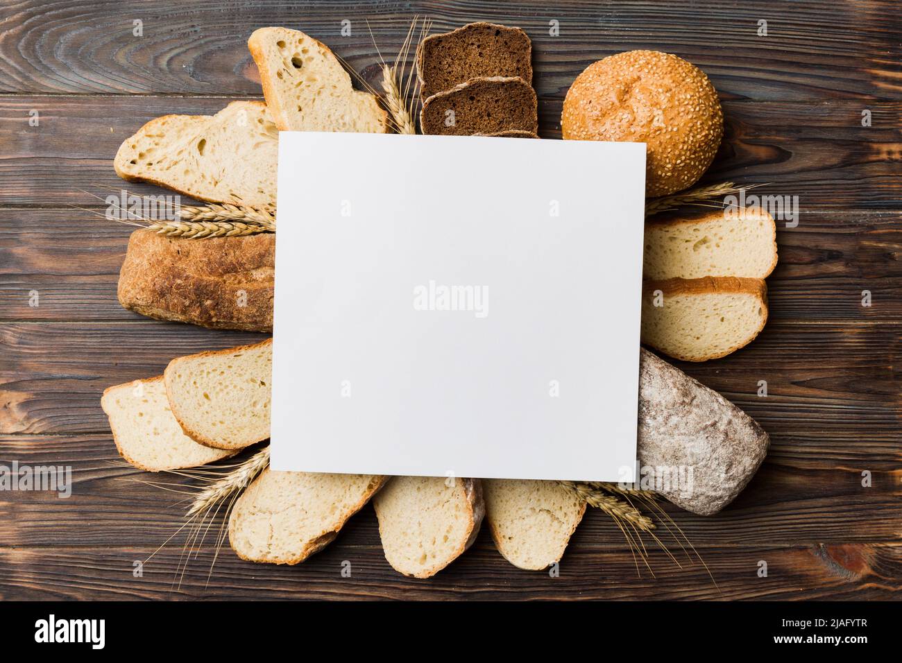 Minimalist paper blank mockup on background of Types of homemade bread ...