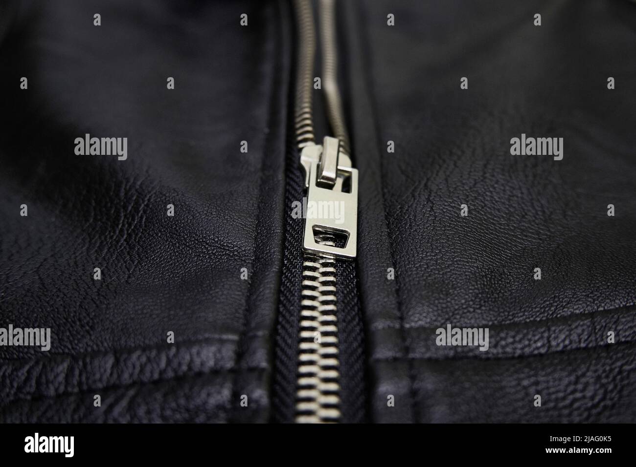 Chrome metal zipper on a leather jacket Stock Photo - Alamy