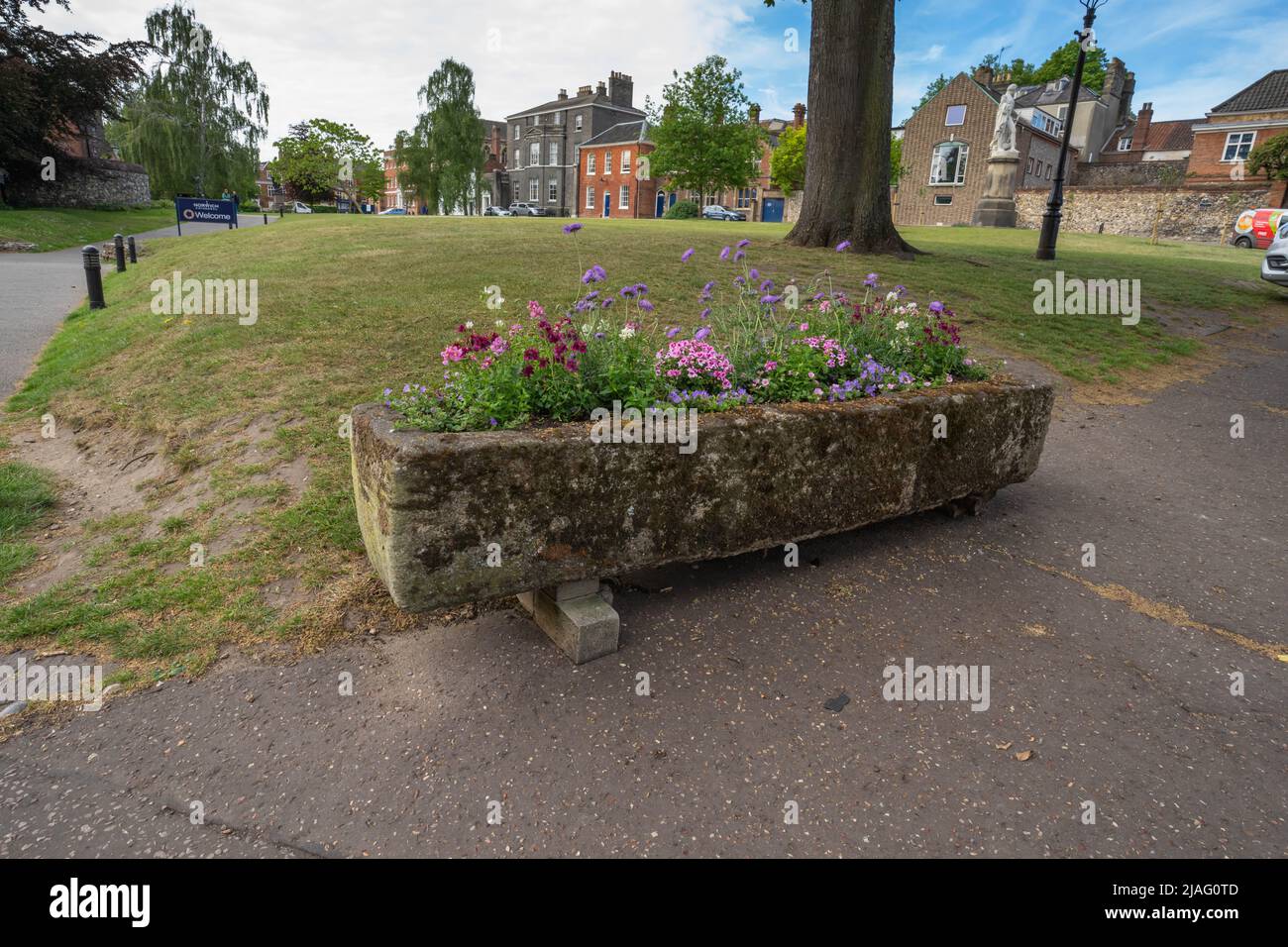 Old cattle/horse trough converted to a colourful planter in norwich ...