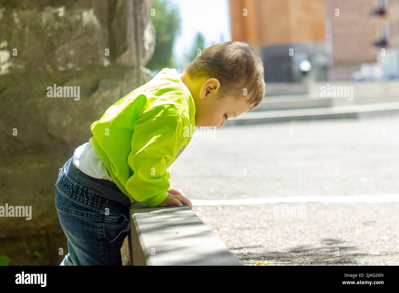 child playing on the street, child playing on the playground Stock ...
