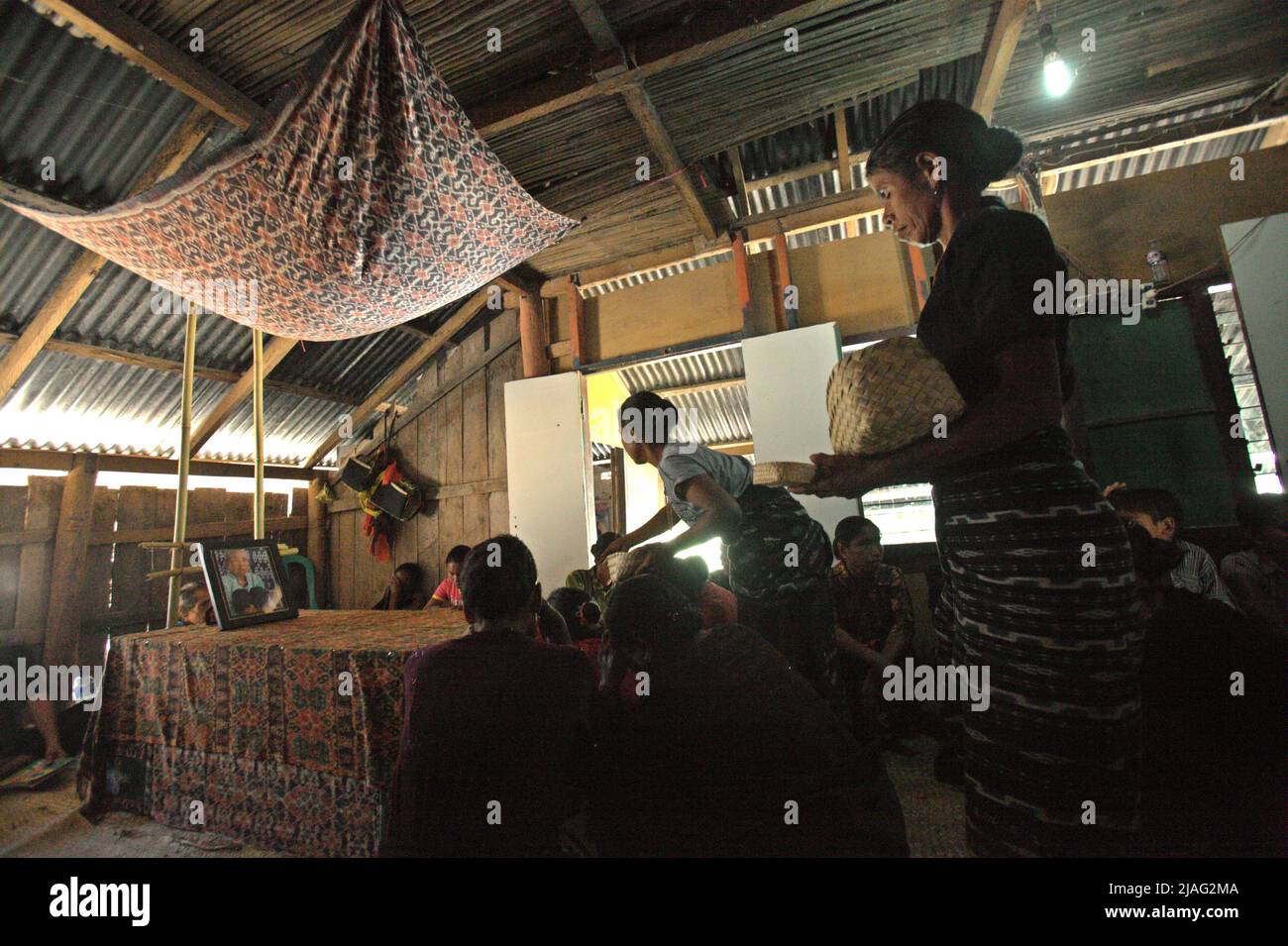 Women mourning during a mourning session as a member of their community ...