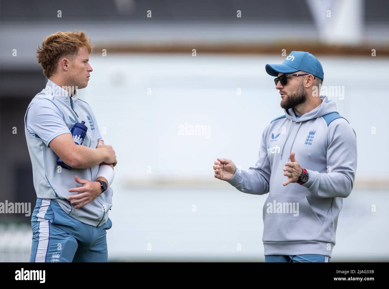 New England men's Test coach Brendon McCullum talking to Ollie Pope ...