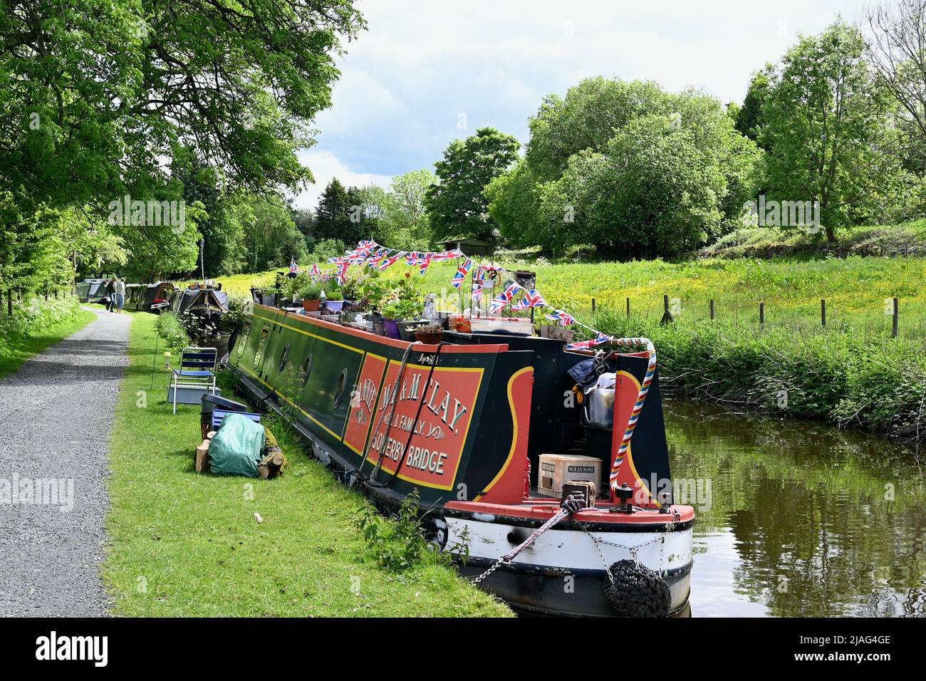 A narrowboat on the Peak Forest Canal, New Mills, Derbyshire, decorated ...