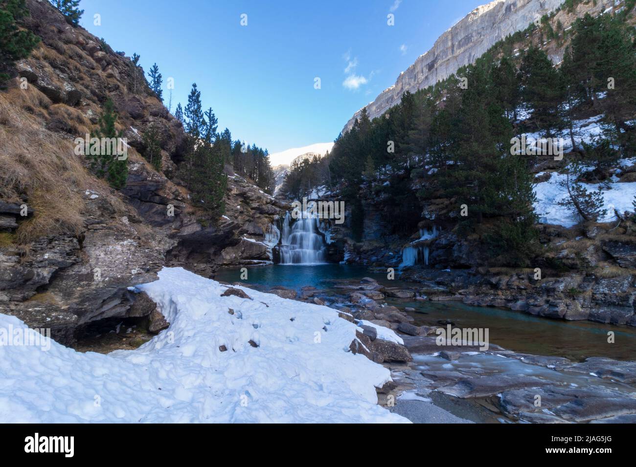 waterfall in ordesa national park in the spanish pyrenees in winter ...