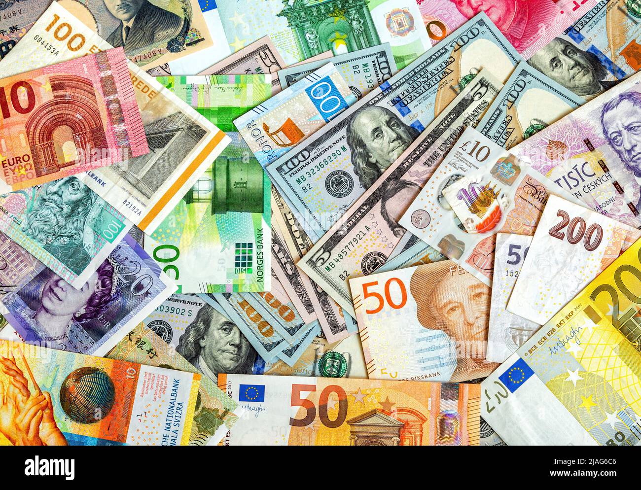 Background from banknotes of various currencies, money background ...