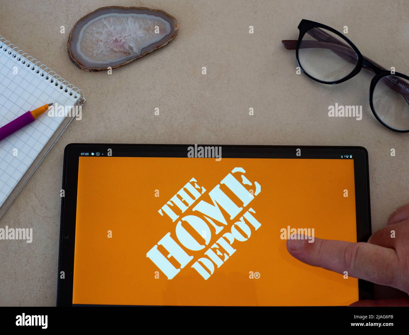 In this photo illustration, The Home Depot, Inc. logo seen displayed on ...