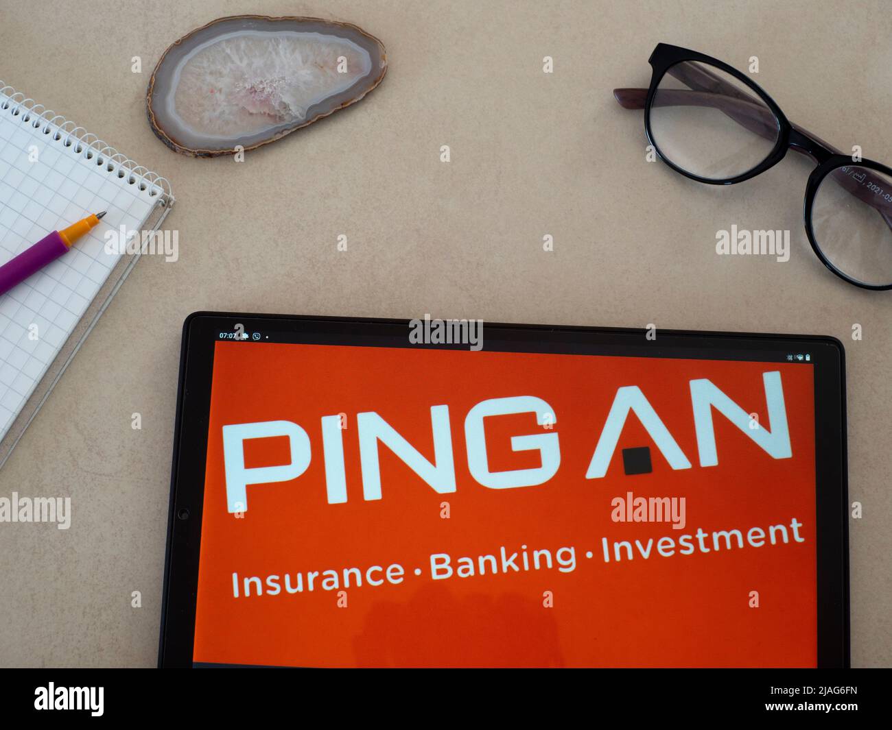In this photo illustration, a Ping An Group logo seen displayed on a ...