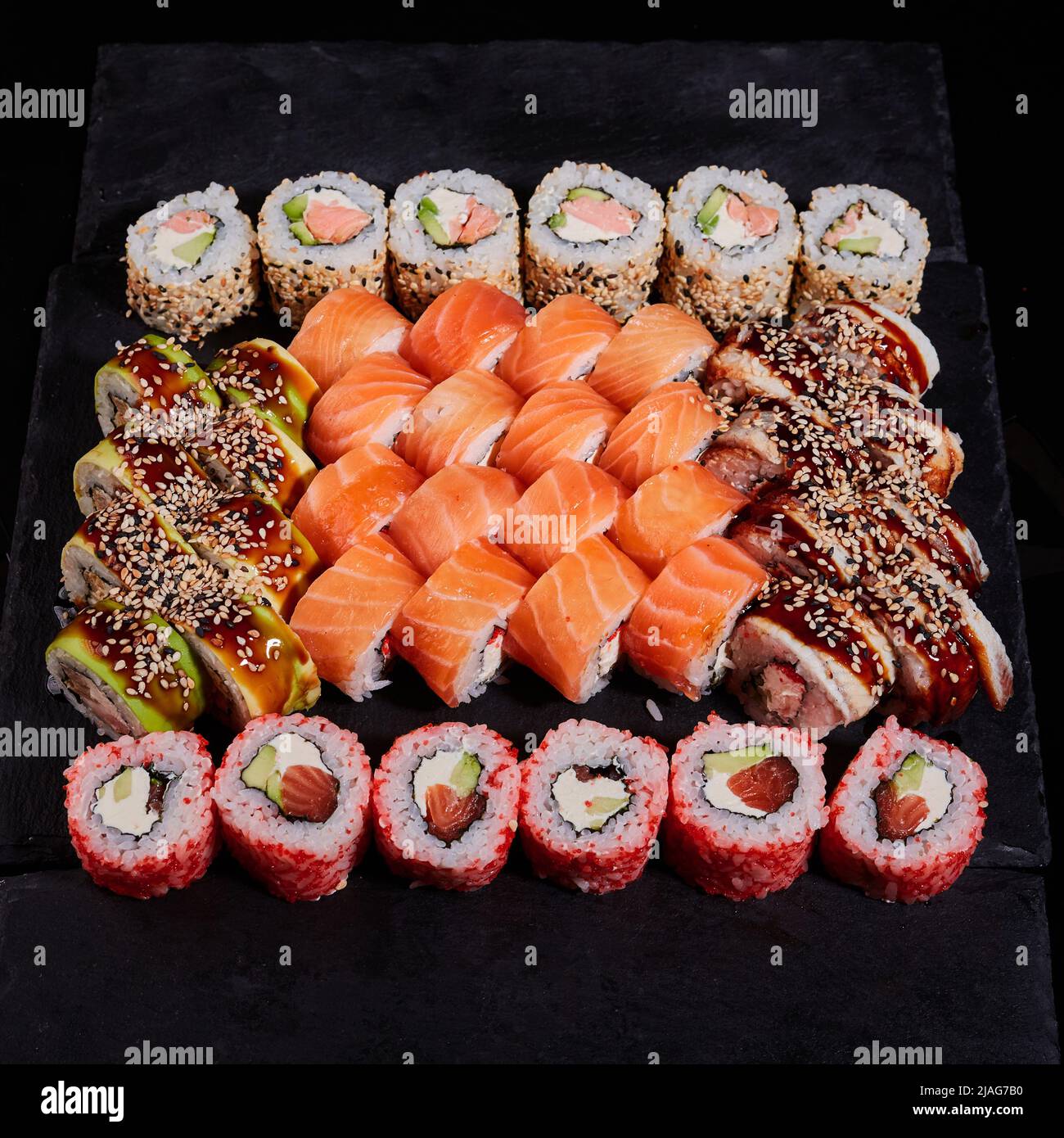 Different types of rolls with different fillings are served square on a ...