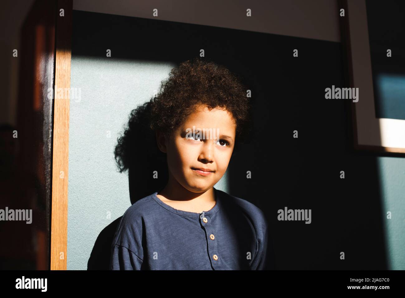 Boy wall standing shadow hi-res stock photography and images - Alamy