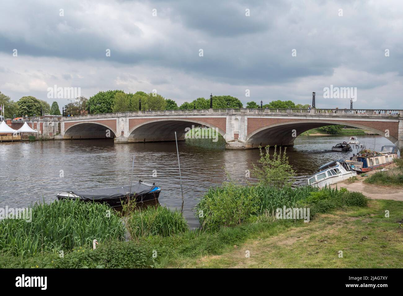 Hampton Court Bridge, a Grade II listed bridge that crosses the River ...