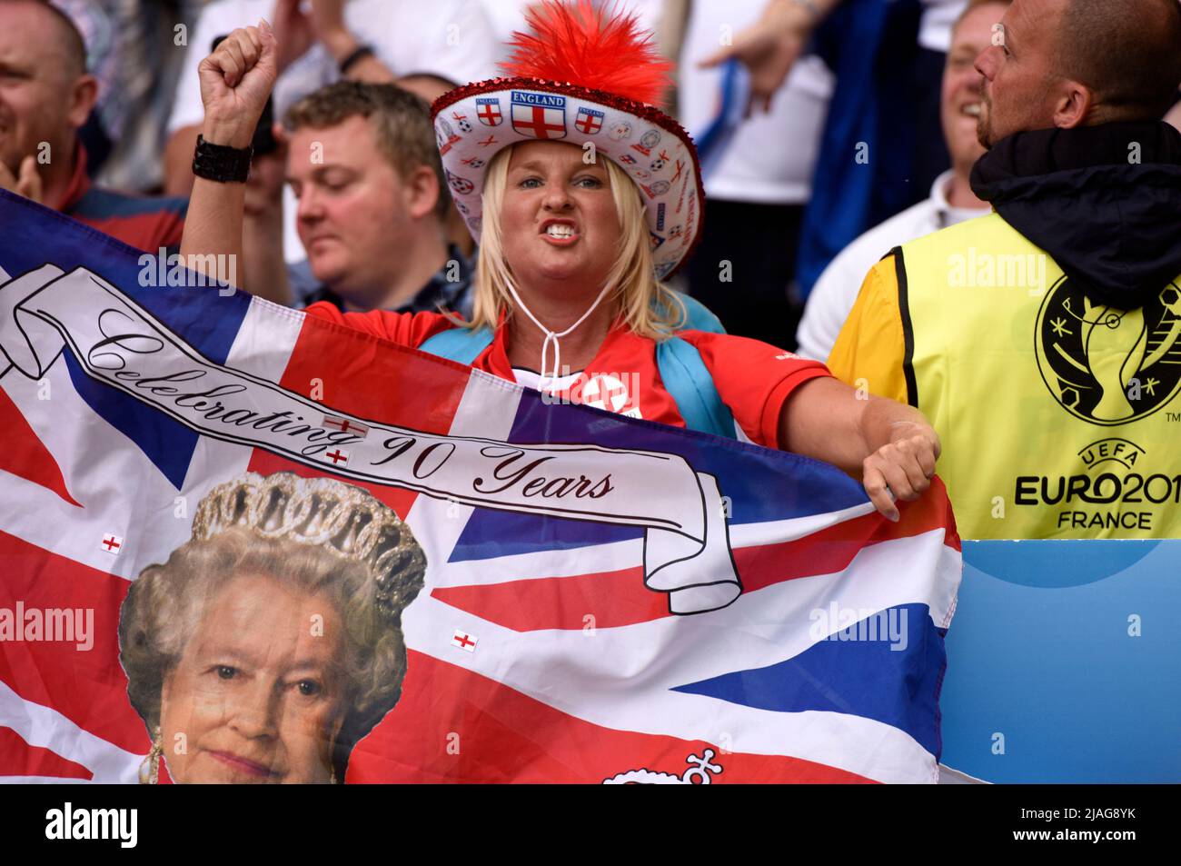 Patriotic England supporters with an image of the Queen at the Stade ...