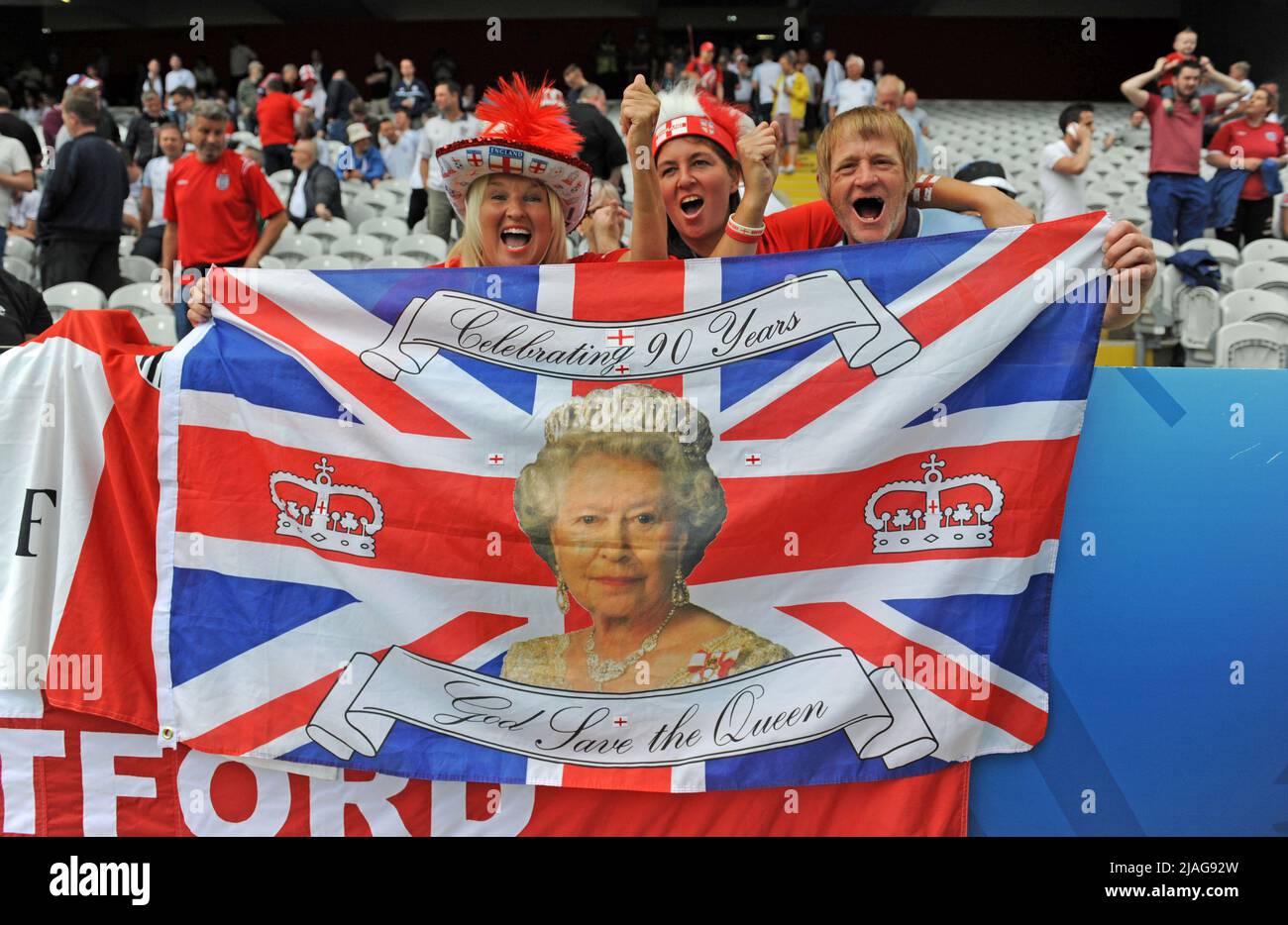 Patriotic England supporters with an image of the Queen at the Stade ...