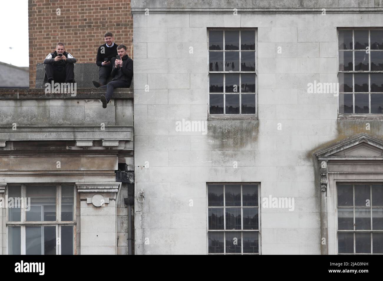 Nottingham Forest fans onto of a roof during the celebrations in Old ...
