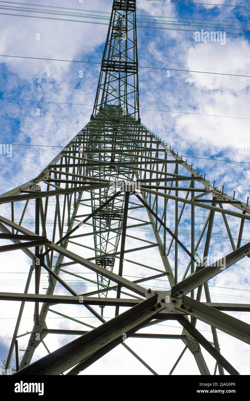 Lattice power tower metal structure bottom-up in architectural ...
