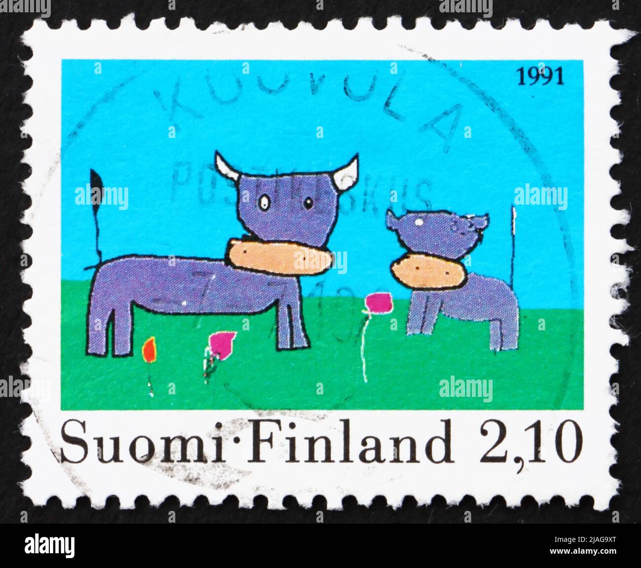 FINLAND - CIRCA 1991: a stamp printed in the Finland shows Cows Grazing ...