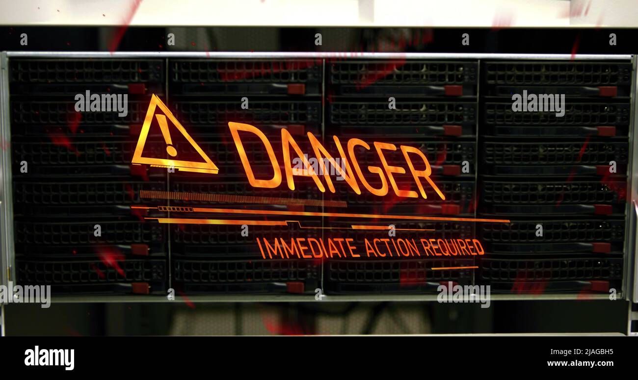 Image of danger text and symbol over server room Stock Photo - Alamy
