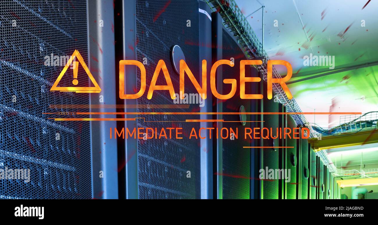 Image of danger text and symbol over server room Stock Photo - Alamy