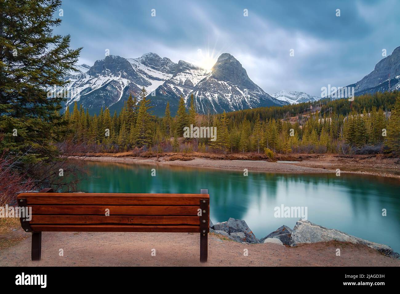 Bench Overlooking Canmore Mountains And River Stock Photo - Alamy