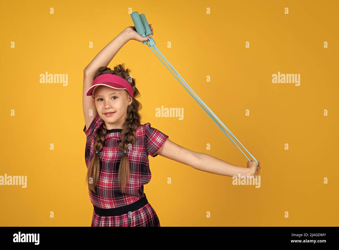 healthy sporty tween girl hold skipping rope, fitness Stock Photo - Alamy