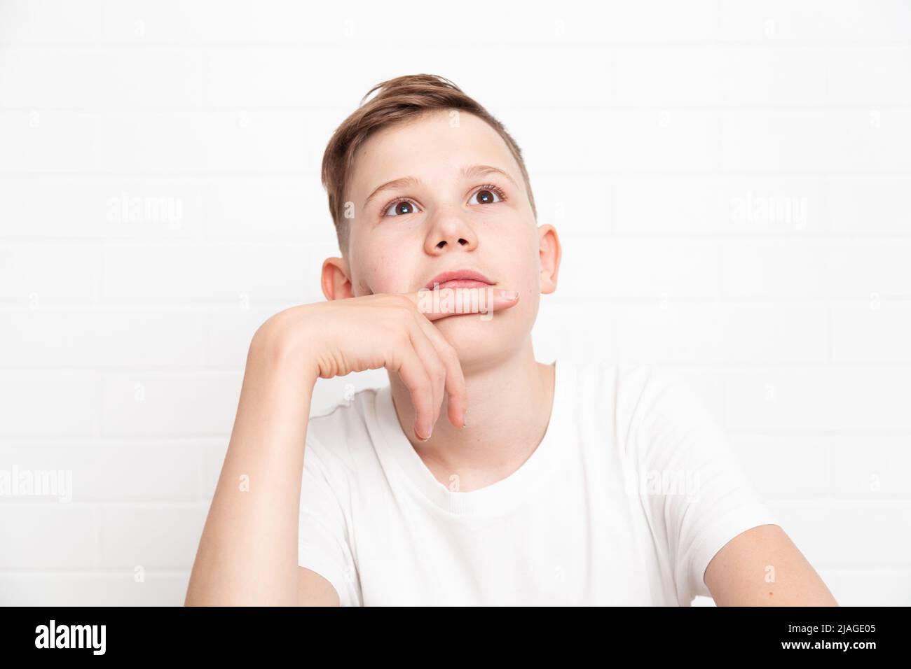European teenager thinking Stock Photo - Alamy