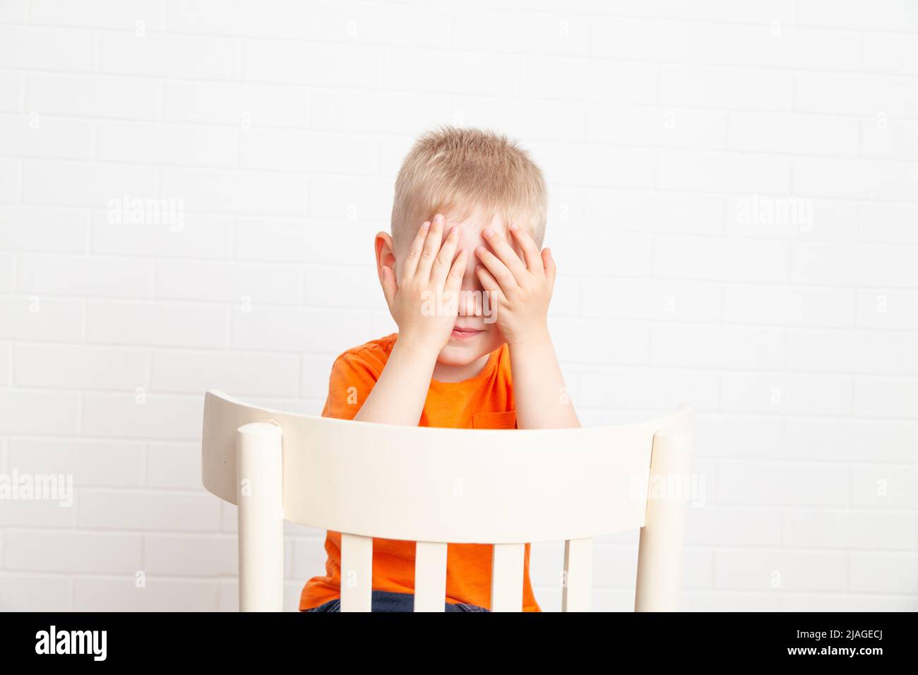 European blond boy gets angry Stock Photo - Alamy
