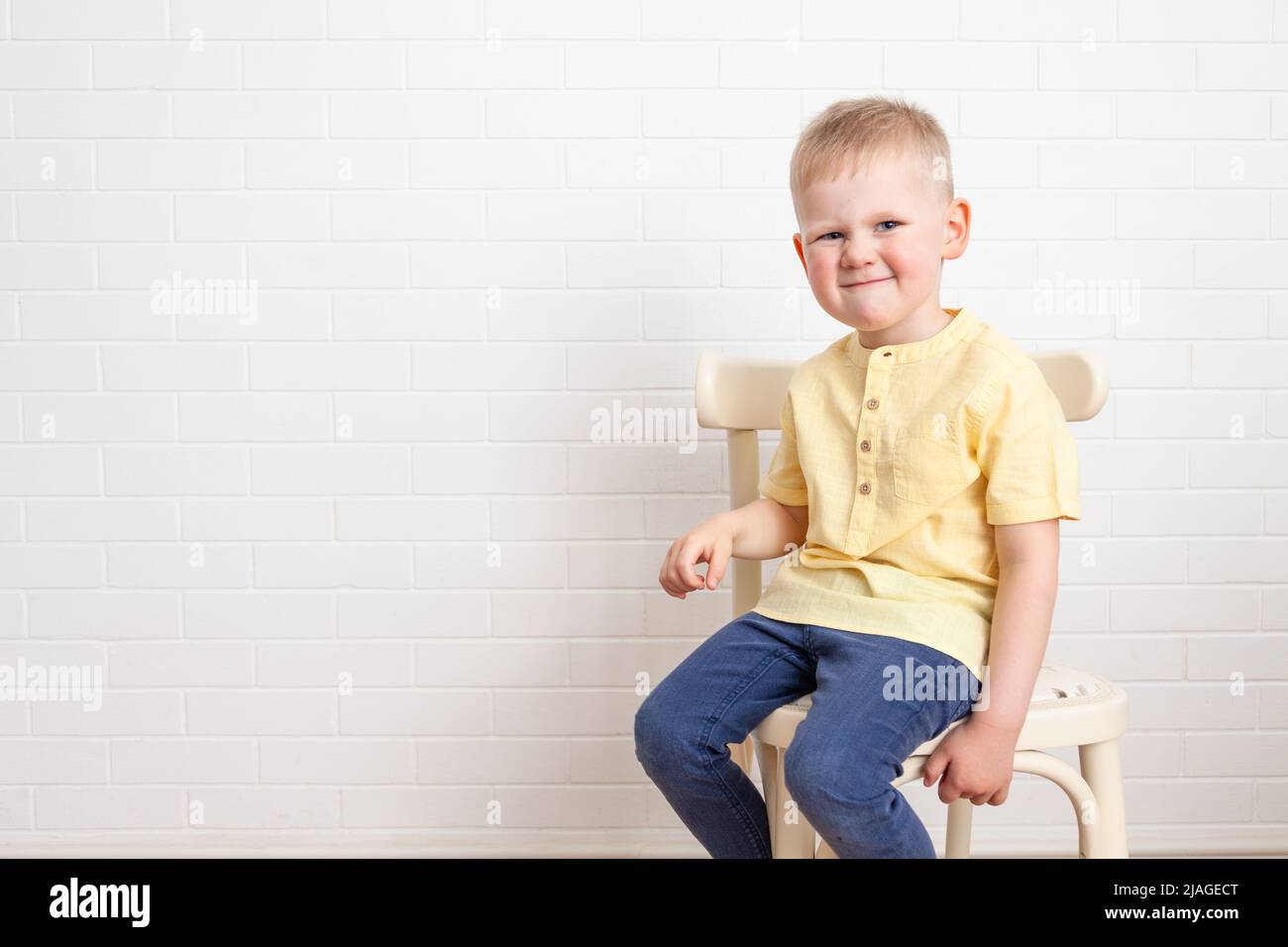 European blond boy gets angry Stock Photo - Alamy