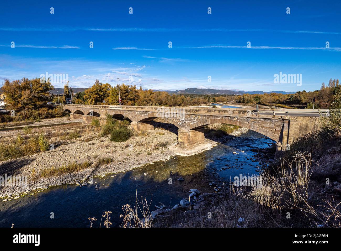 The entrance bridge of Puente la Reina de Jaca in Aragon, Spain. A ...