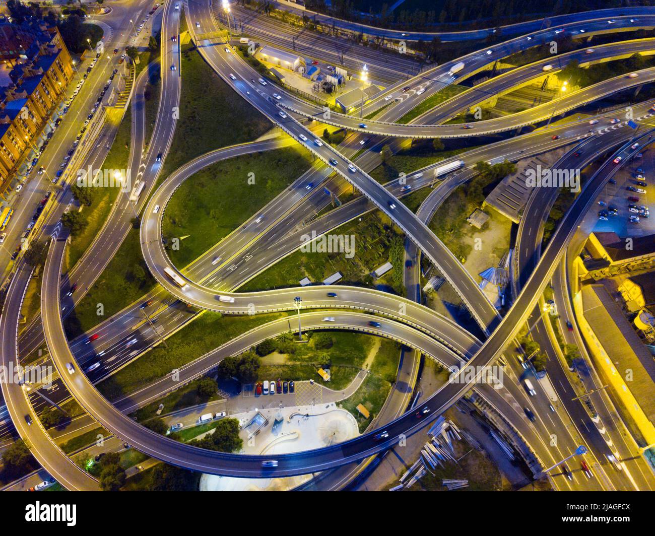 Aerial view of highway grade separation at night Stock Photo - Alamy