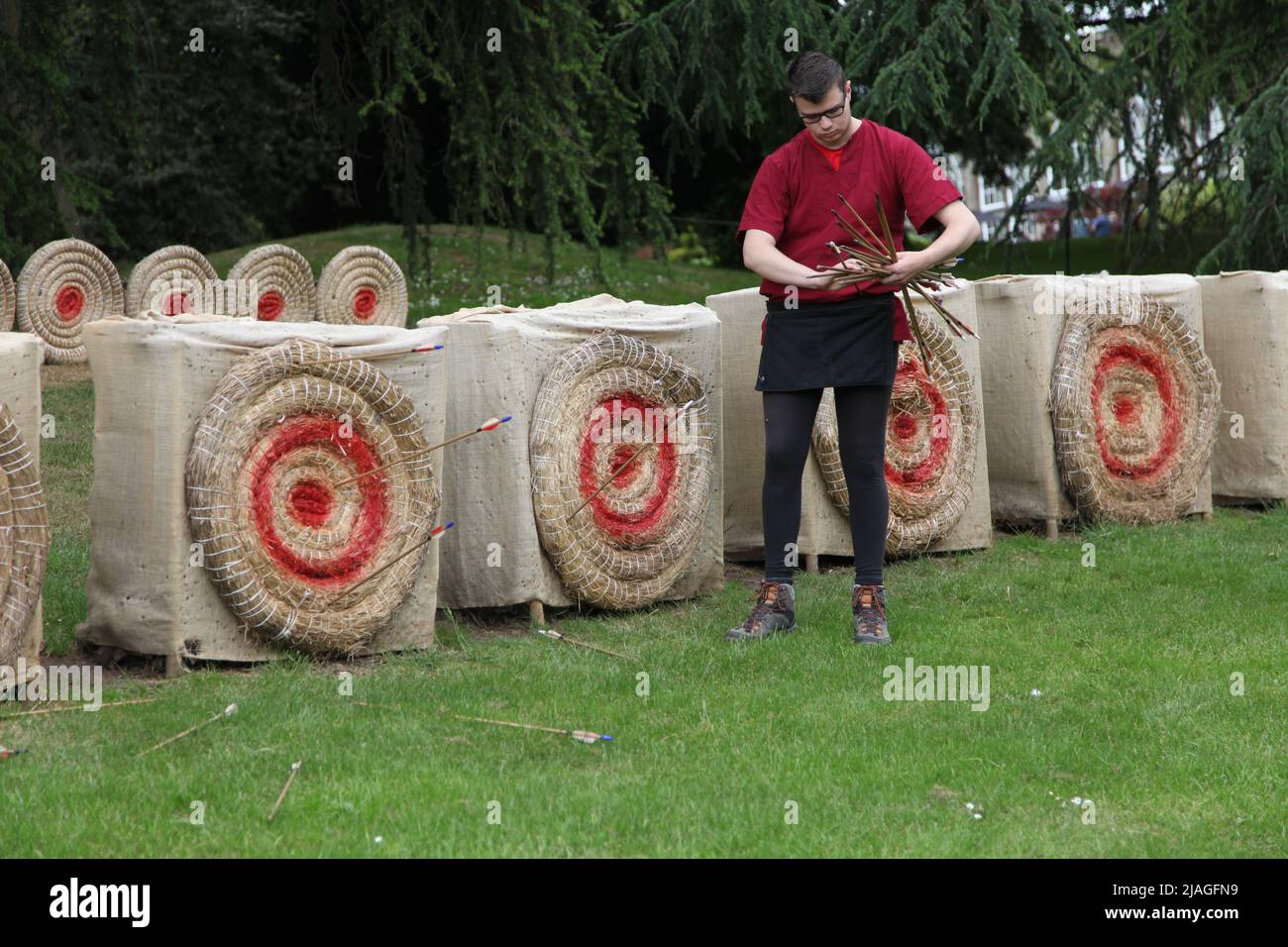 Warwick castle archery man collecting arrows, Warwickshire, West ...