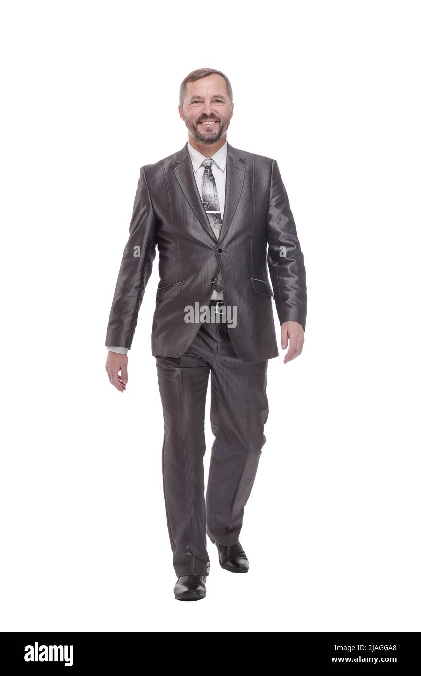 in full growth. confident business man striding forward Stock Photo - Alamy