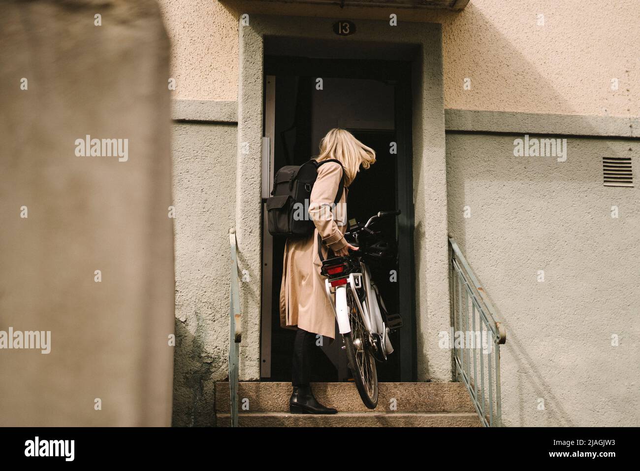 Entering building hi-res stock photography and images - Alamy