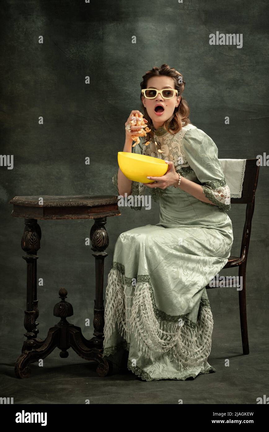 Young girl with shocked facial expression in image of medieval royal ...