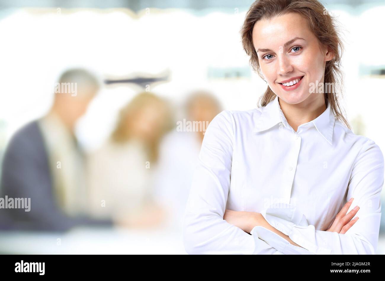 Business lady with positive look and cheerful smile posing for the ...