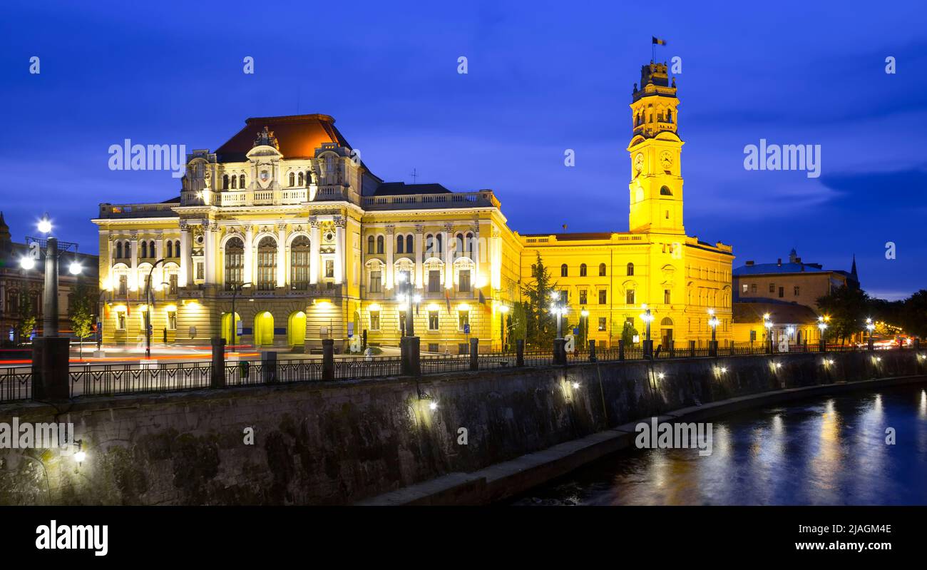 Oradea City Hall and river Crisul Repede in night Stock Photo - Alamy