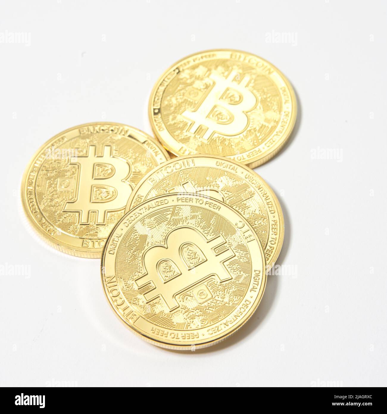 Bitcoin coin above digital hi-res stock photography and images - Alamy