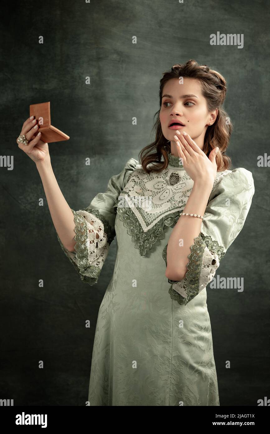 Emotional young beautiful girl, actress in image of medieval person ...