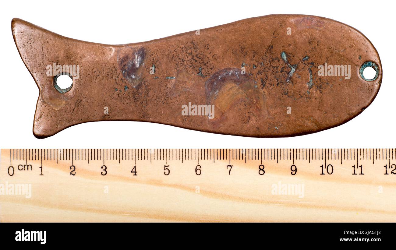 Ancient copper coin in the form of fish. Liao dynasty. China. Isolated ...