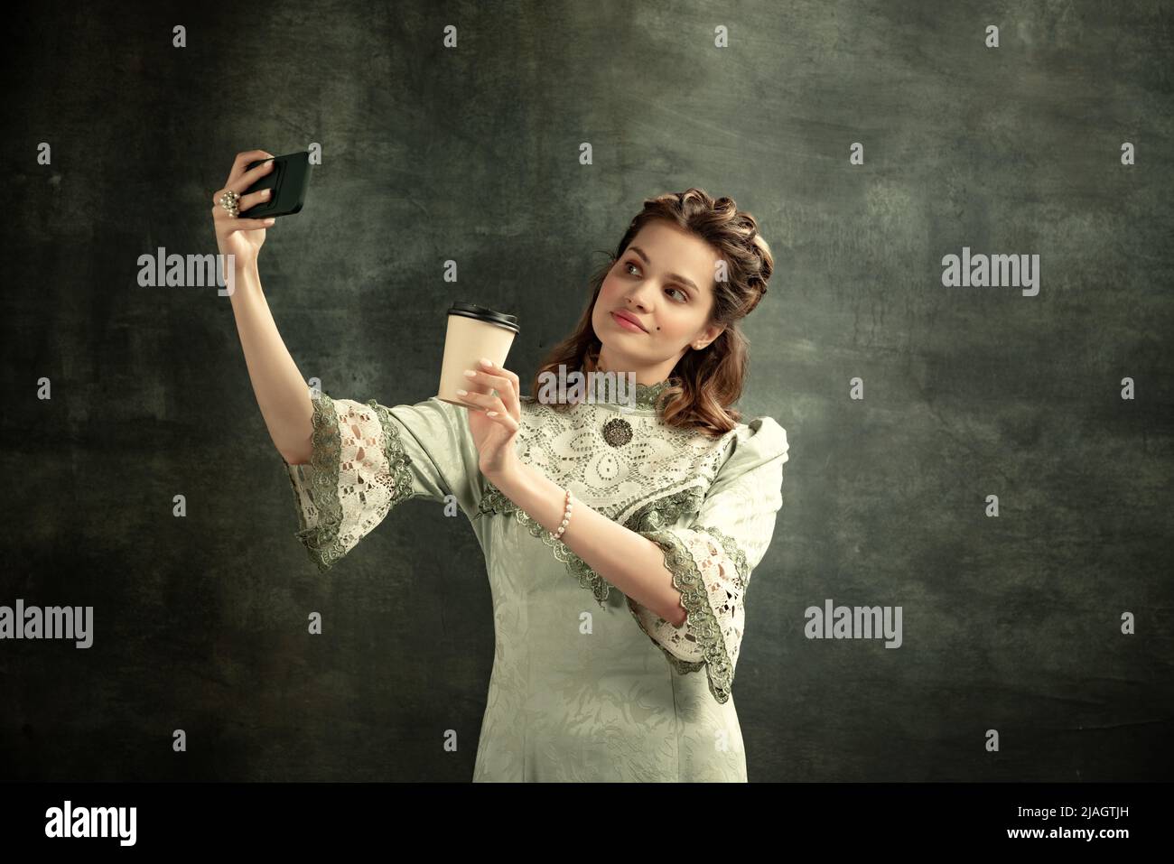 Emotional young beautiful girl, actress in image of medieval person ...